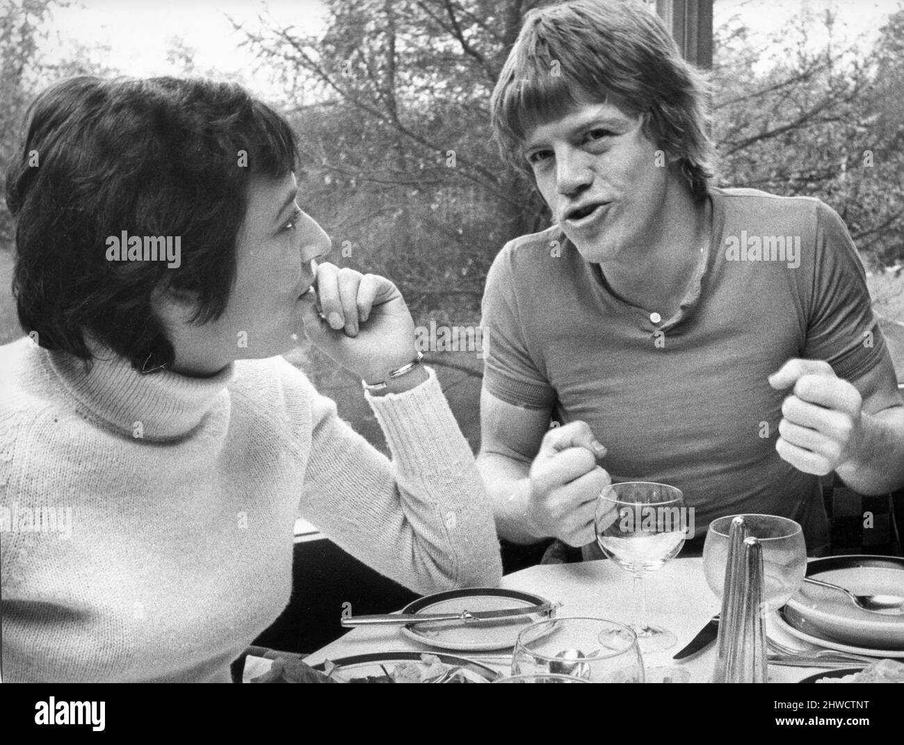 Actor Robin Askwith is interviewed over lunch by reporter Avril Deane ...