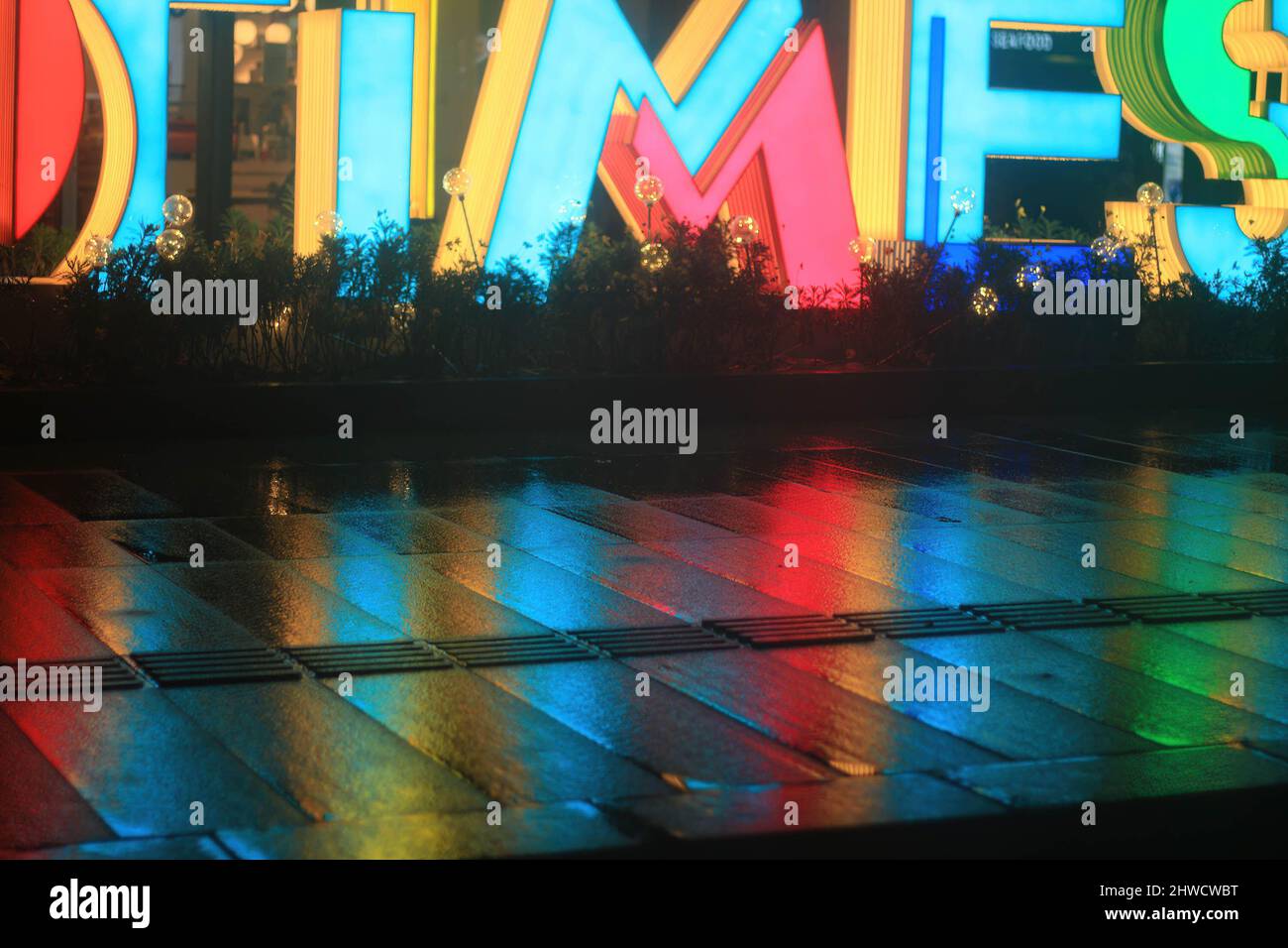 Suzhou, China. 23rd Jan, 2022. The word ''TIME'' mirrored in a walking ...