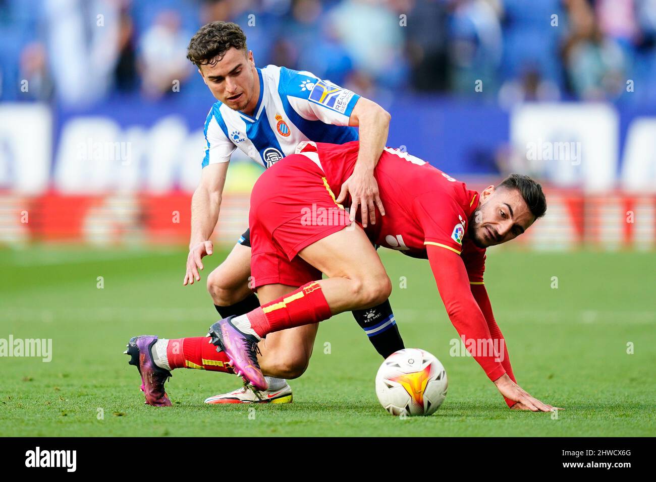 Adria Giner of RCD Espanyol and Juan Iglesias of Getafe CF during the ...