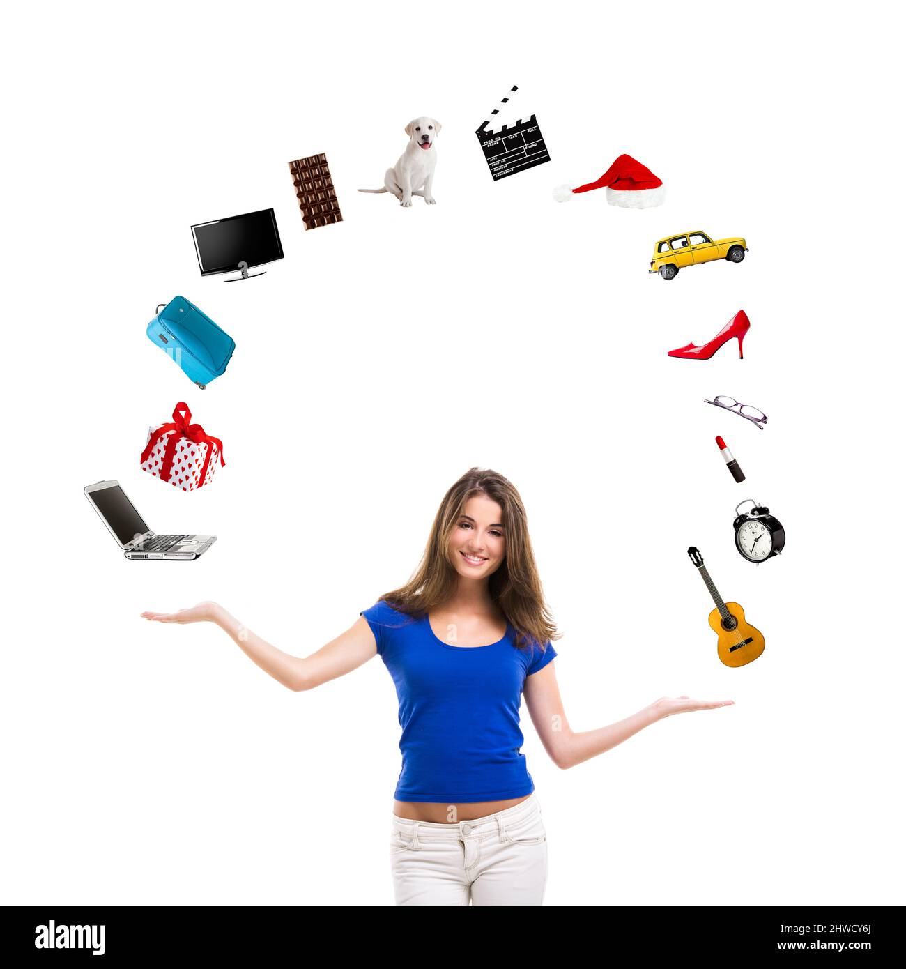 A Beautiful young woman juggling multiple objects over the air Stock ...
