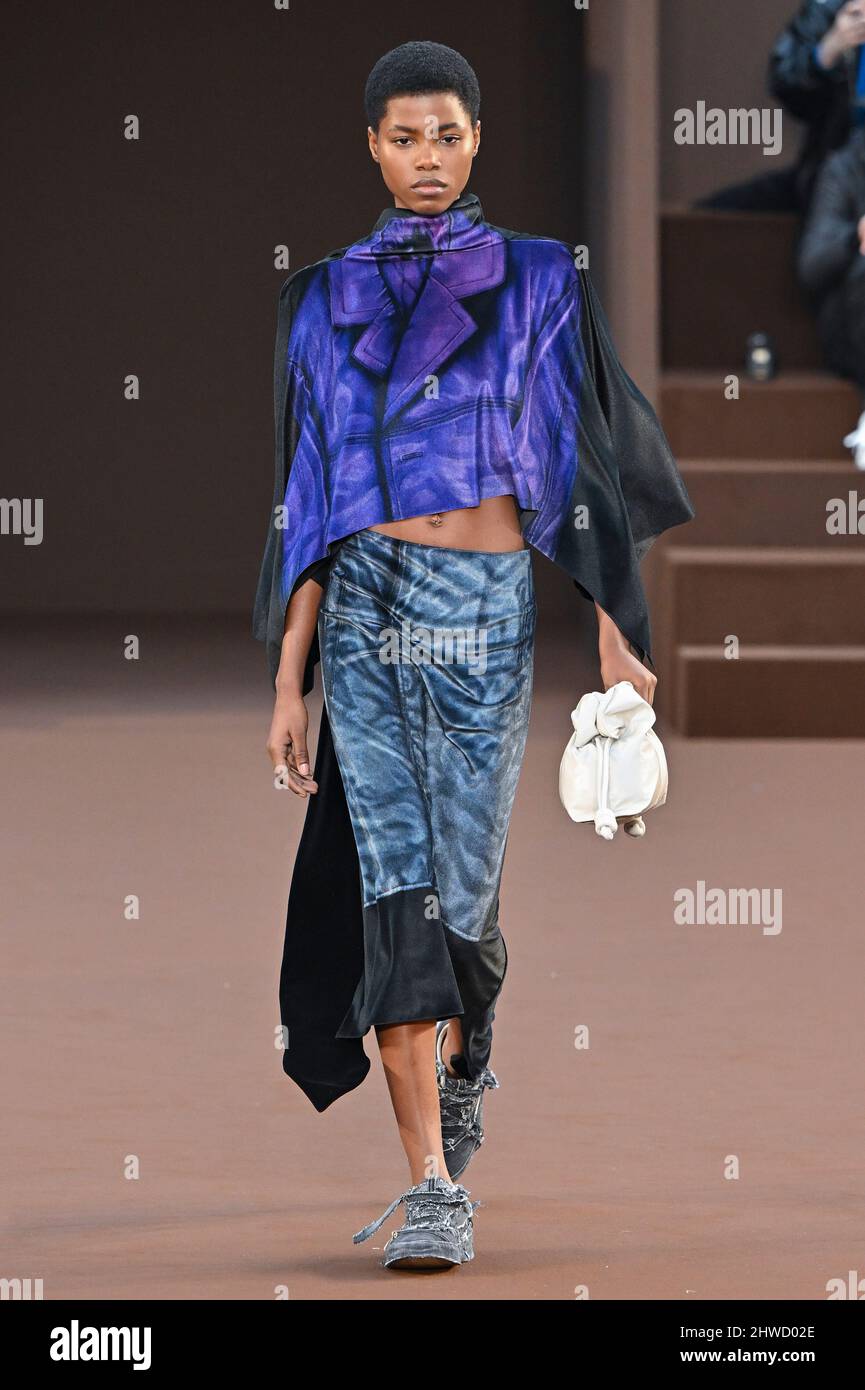 Model Victoria Fawole walks on the runway at the Loewe fashion show ...