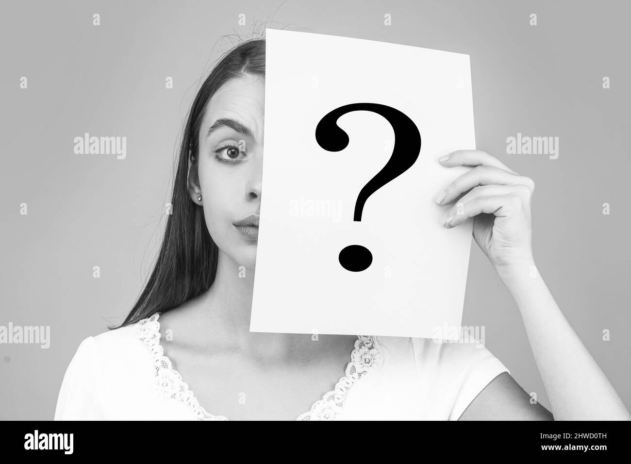 Unknown woman holding question mark. Girl holding paper question mark ...