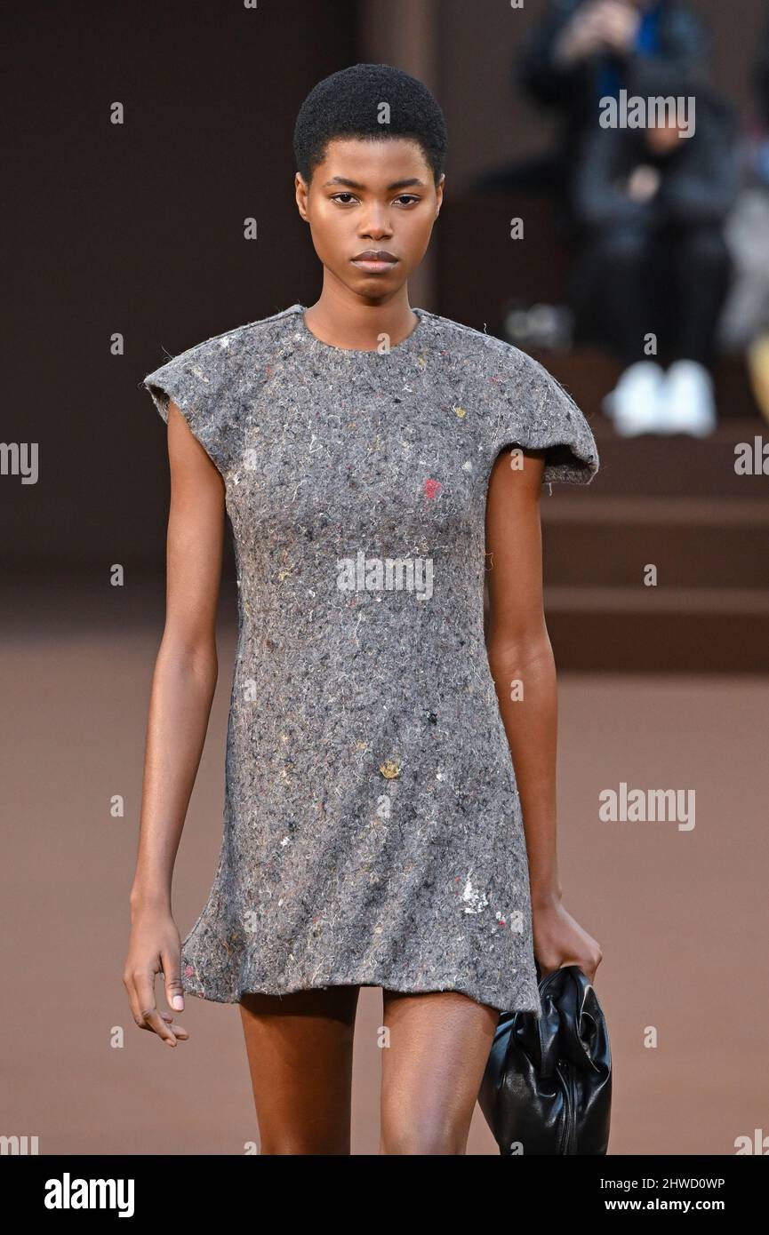 Model Victoria Fawole walks on the runway at the Loewe fashion show ...