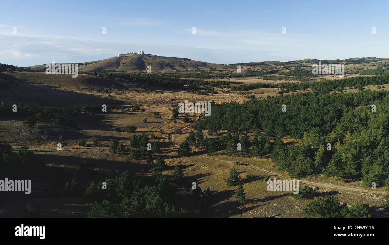 View of panorama from land of hilly valley. Shot. Top view of stone ...