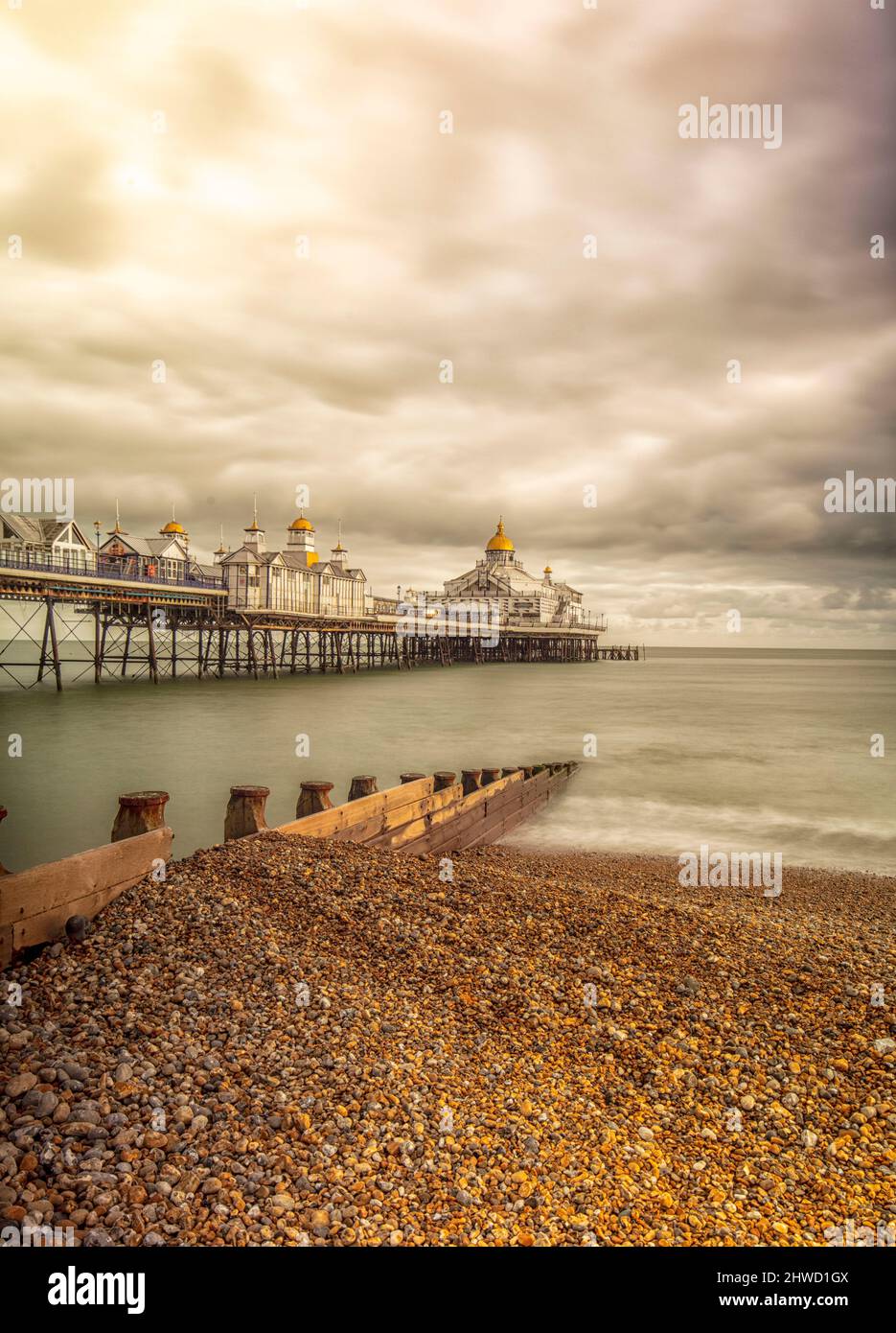 Eastbourne Pier in bright early summer sunshine, East Sussex, England ...
