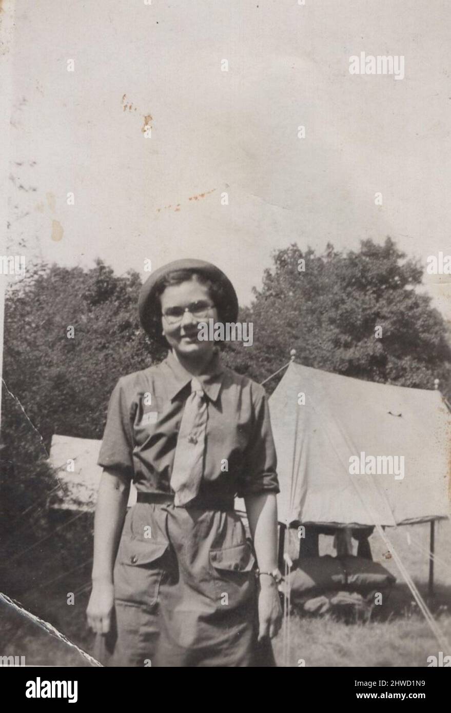 Historical Archive Image about a happy scout girl in uniform in a scout ...
