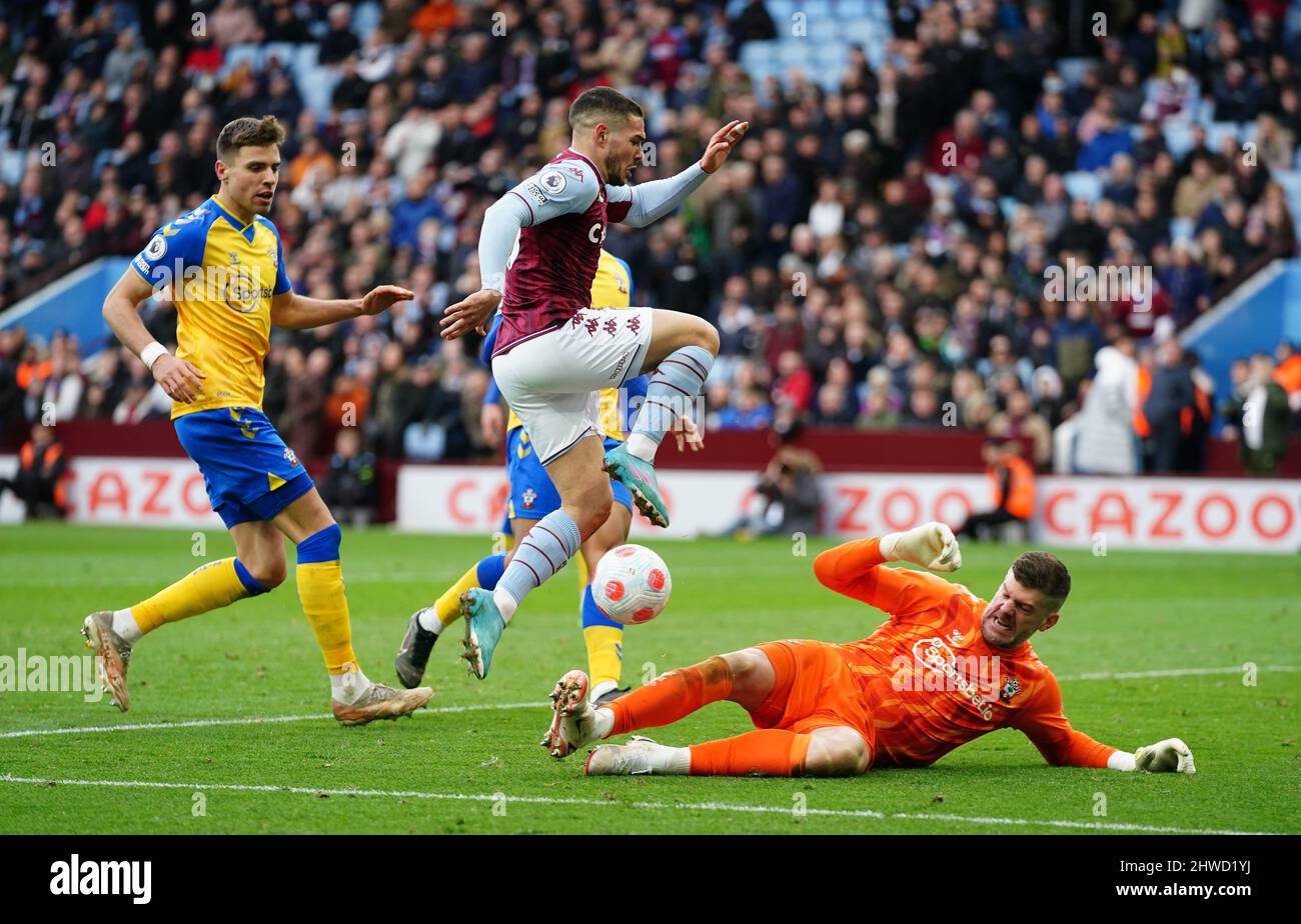 Southampton goalkeeper Fraser Forster slides in to save from Aston ...