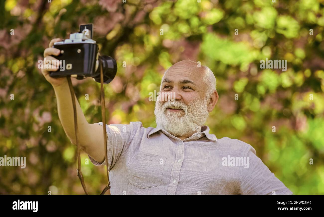 cool selfie. professional photographer designer. man tourist use camera ...