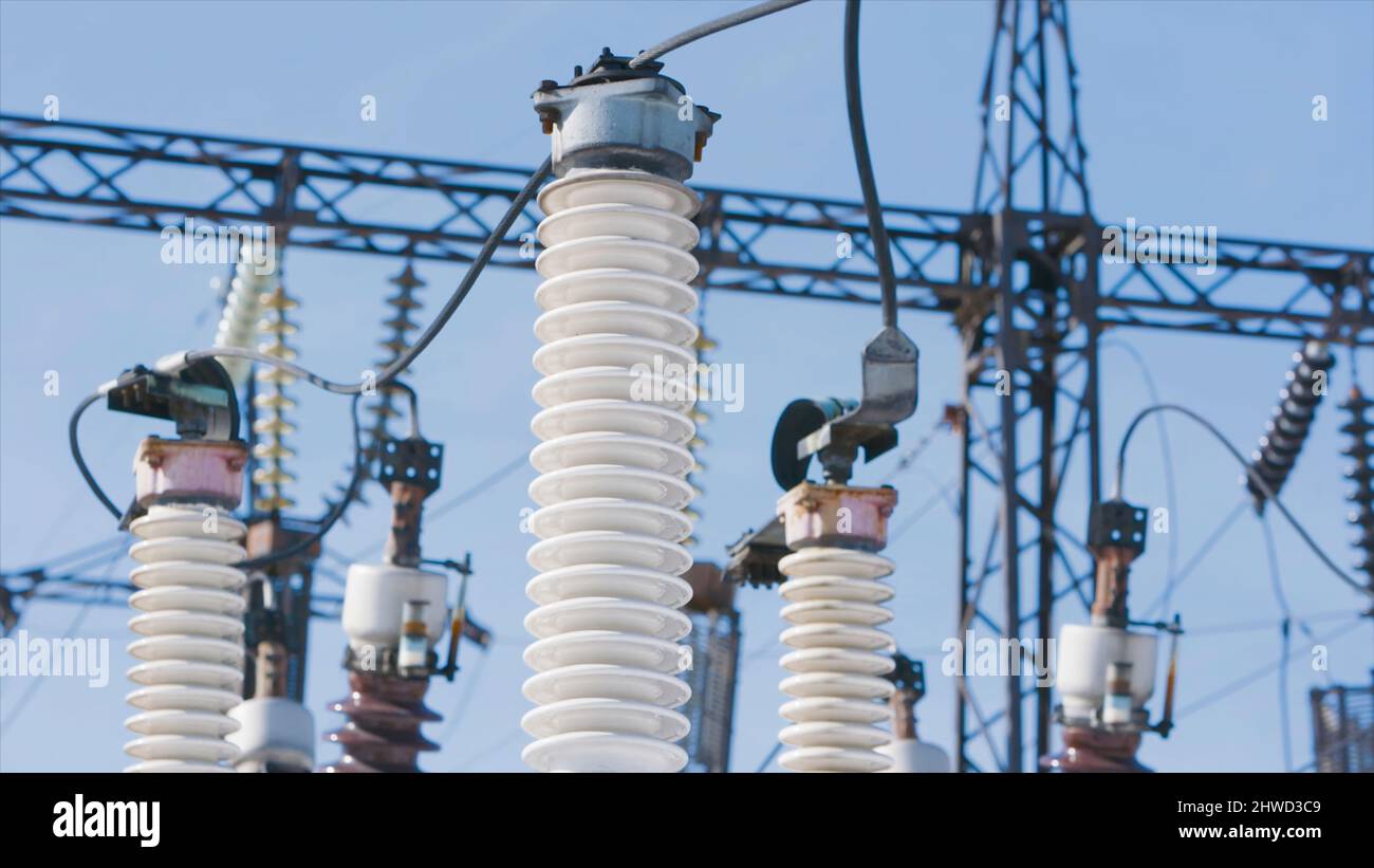 Many power poles in substation. Action. Electric substation with ...