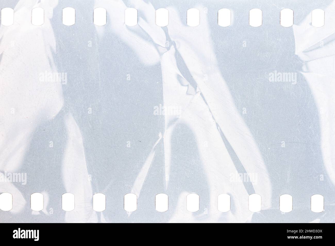 Dusty and grungy 35mm film texture or surface. Perforated scratched ...