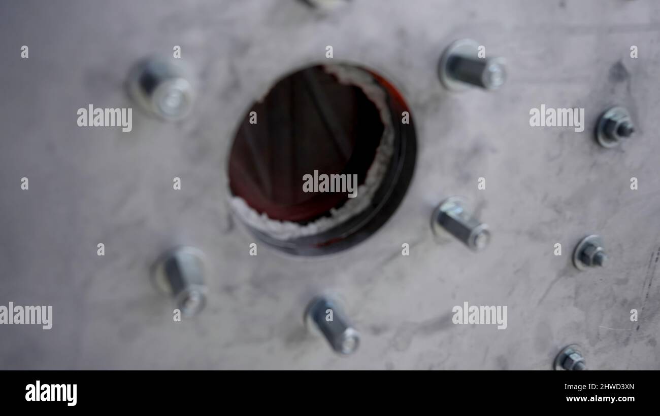 Close-up of melting furnace. Steel closed chamber metal melting furnace ...