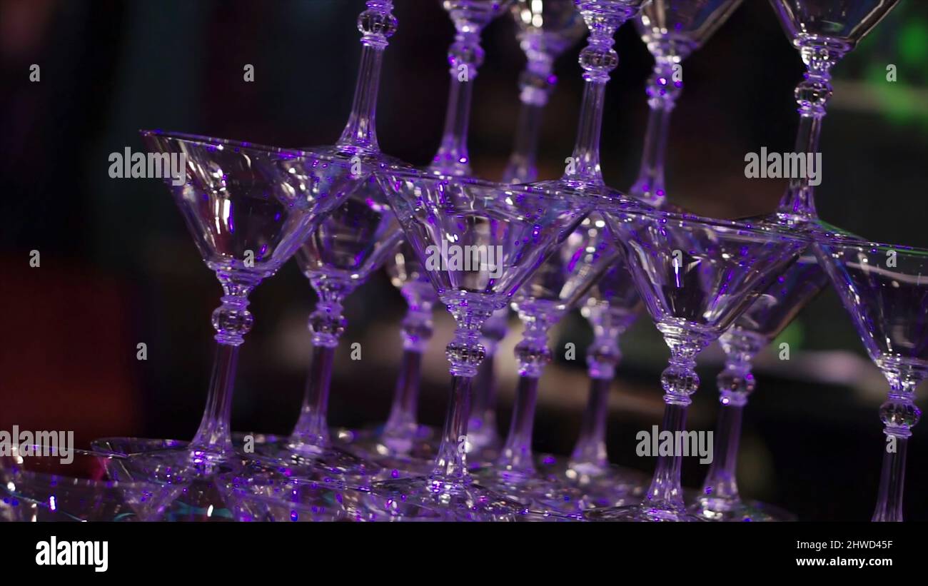Champagne glass pyramid. Clip. Pyramid of glasses of wine, champagne ...