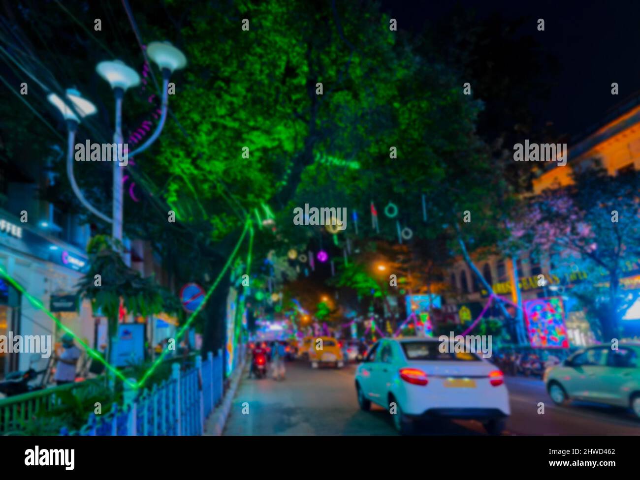 Blurred image of Park street is decorated with diwali lights for the ...