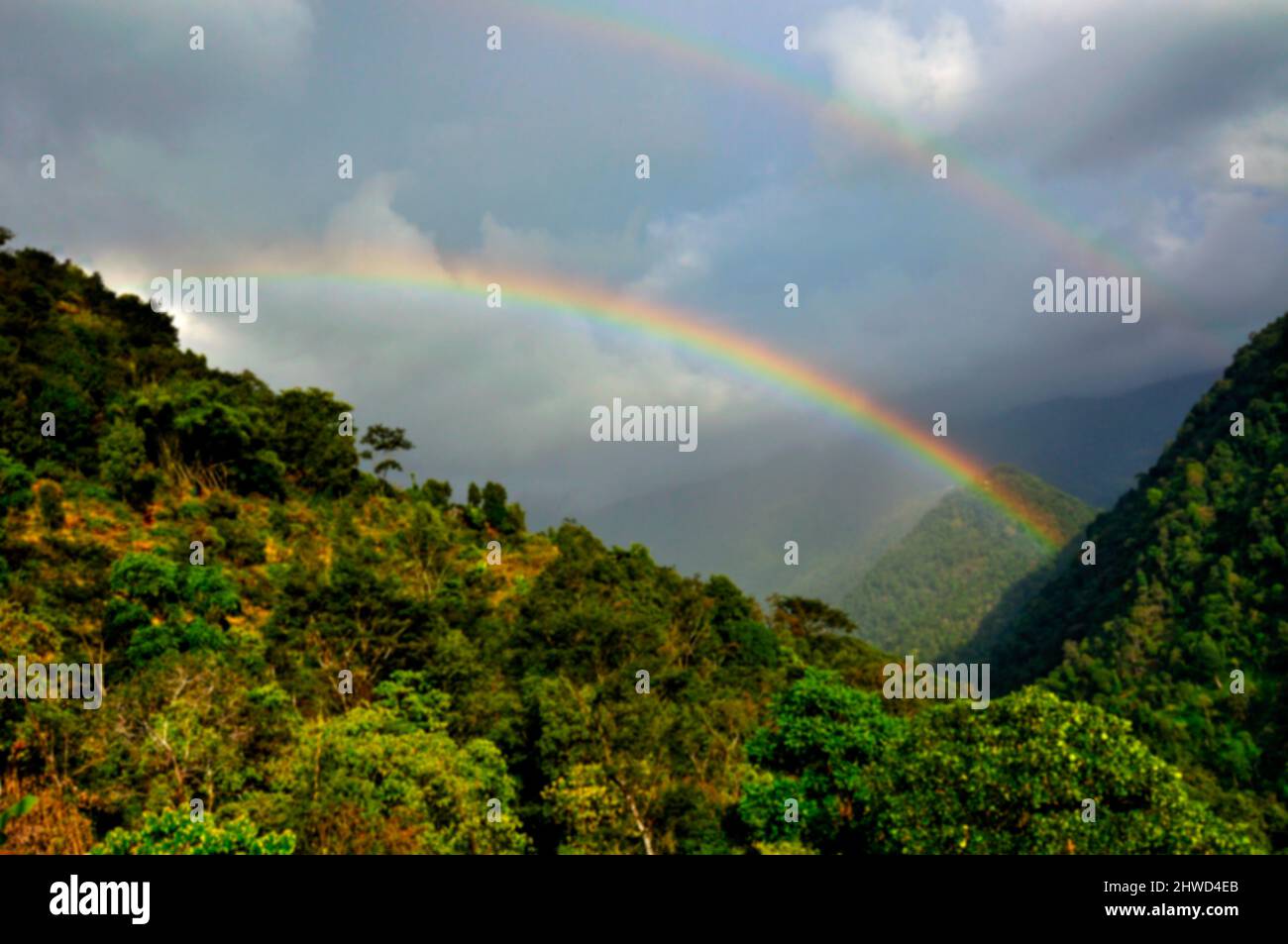 Blurred image of Rainbow on cloudy sky , Sikkim, Himalayan mounatains ...