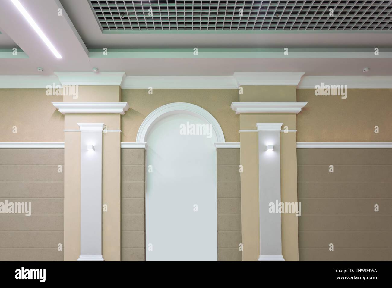 Detail of corner ceiling with intricate crown molding on column with ...