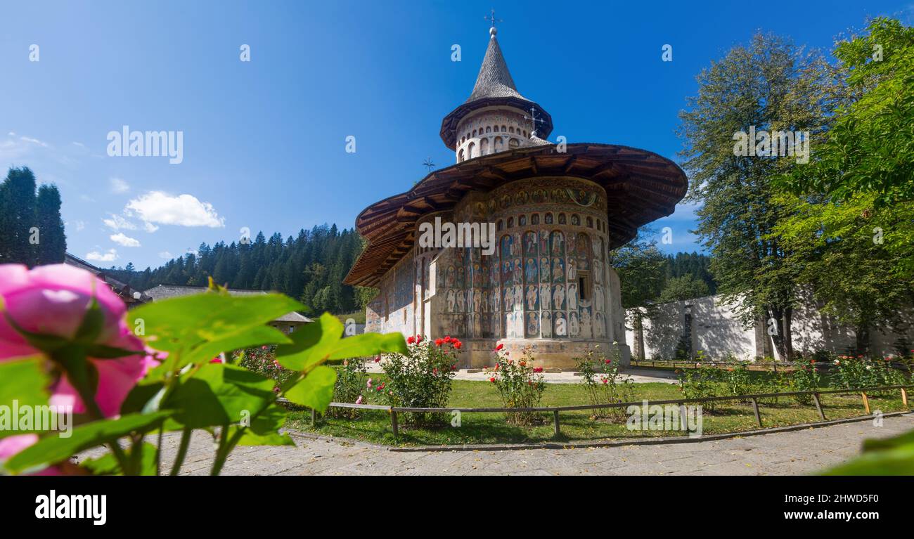 View of painted church in medieval monastery in romanian village ...