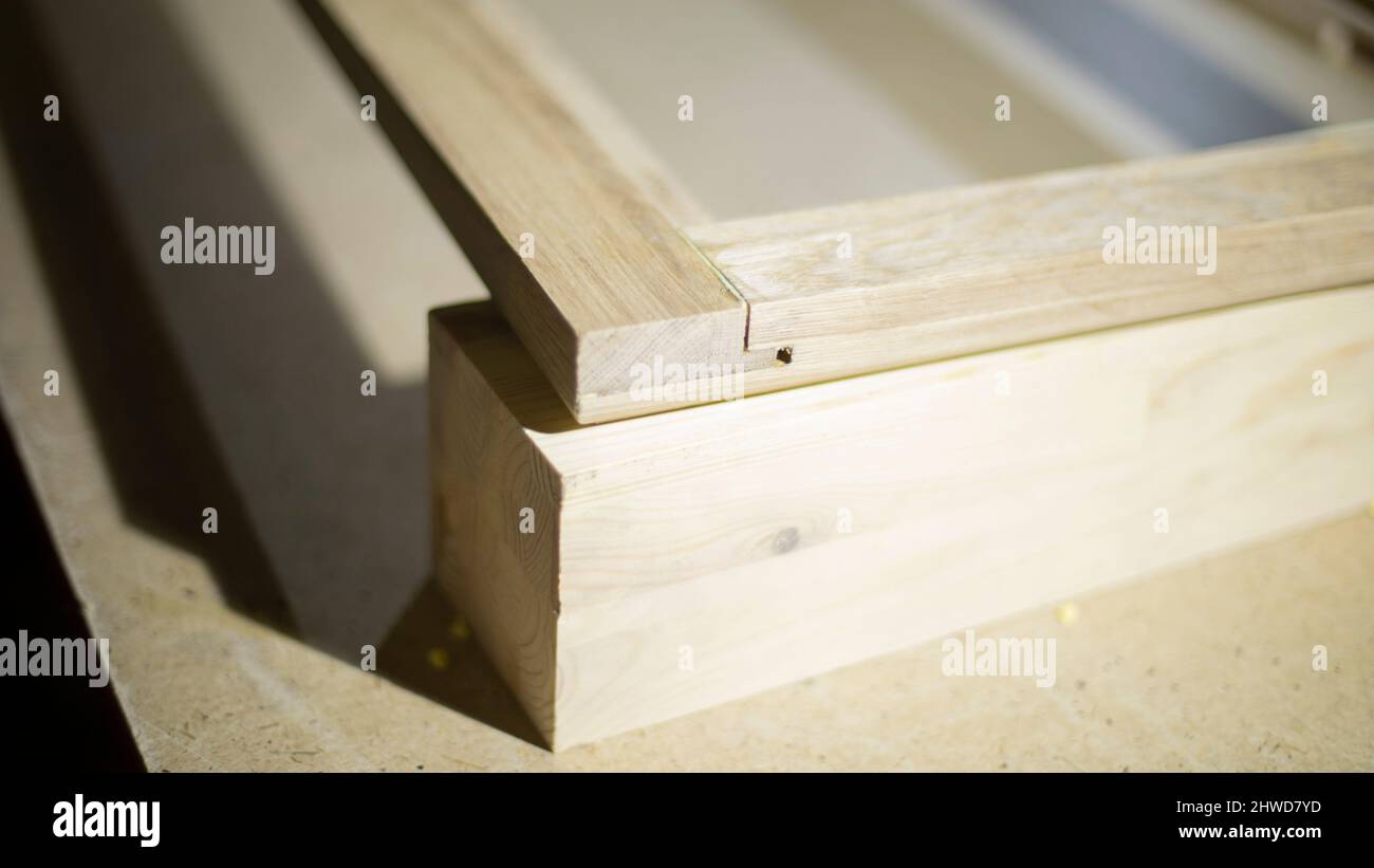 Angle of frame. Raw wood. Processing of boards to create interior ...