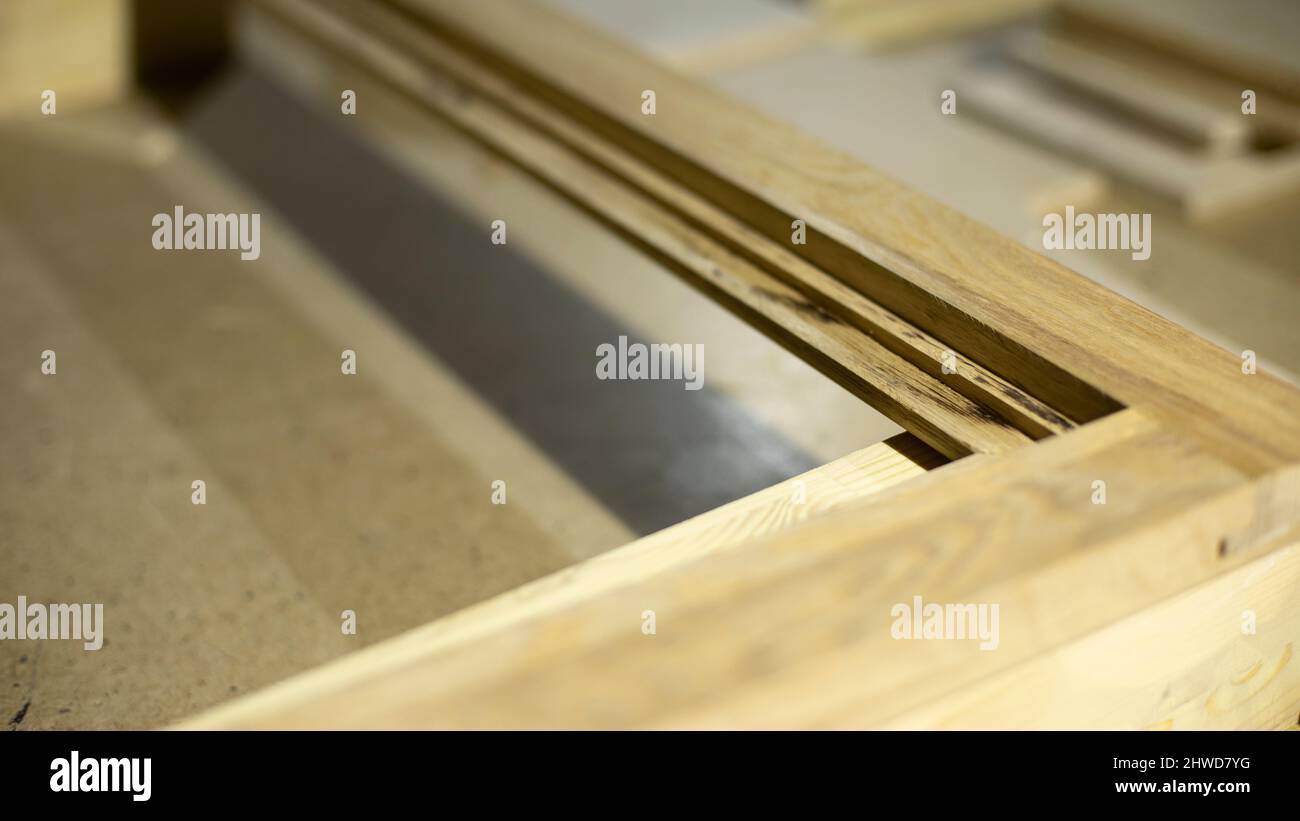 Angle of frame. Raw wood. Processing of boards to create interior ...