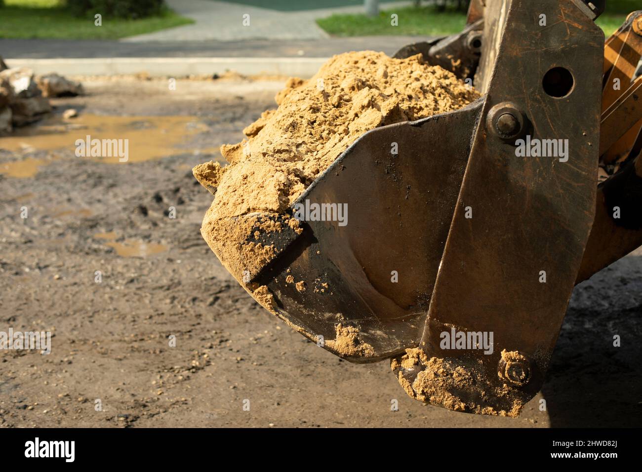 Heavy machinery at construction site. Details of embankment ...