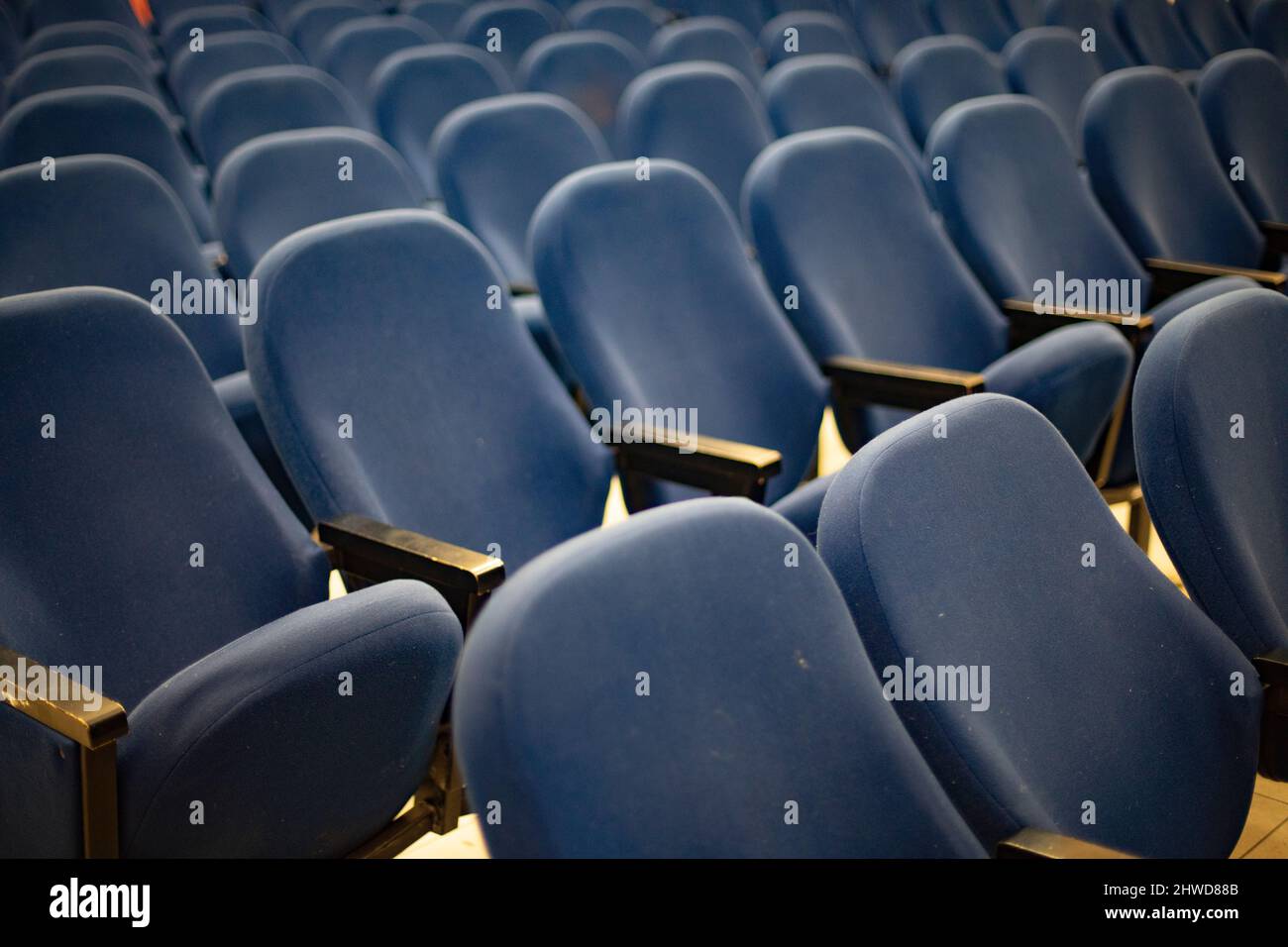 Seats are blue. Interior details. Chairs in cinema. Room for watching ...