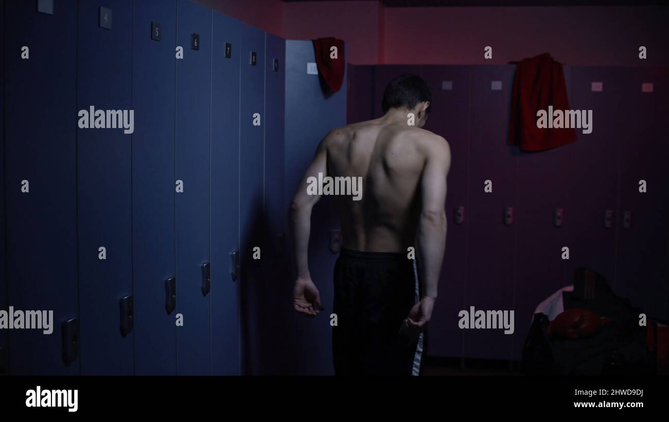 Boxer in locker room. Boxer after defeat of evil frustration and threw ...
