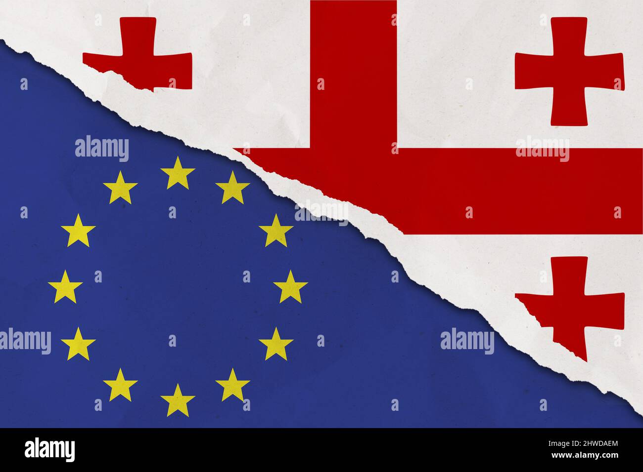 Georgia and European Union flag ripped paper grunge background. The ...