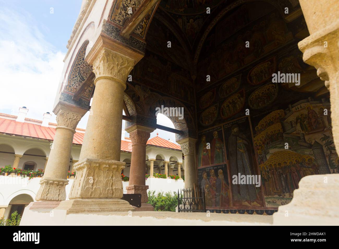 Closeup of porch of church at Horezu Monastery with colorful religious ...
