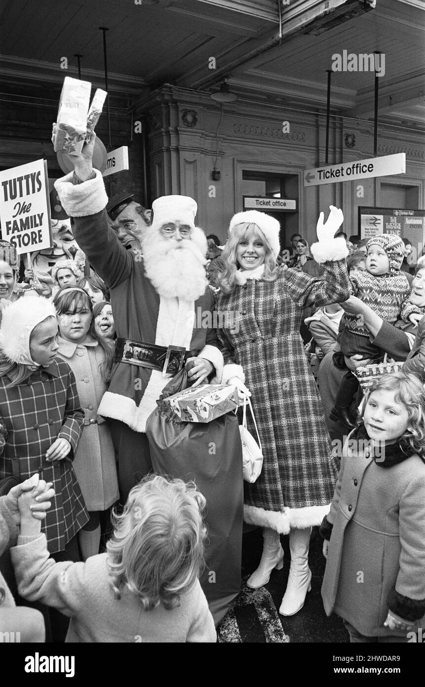 Father Christmas seen here arriving at Reading railway station to take ...