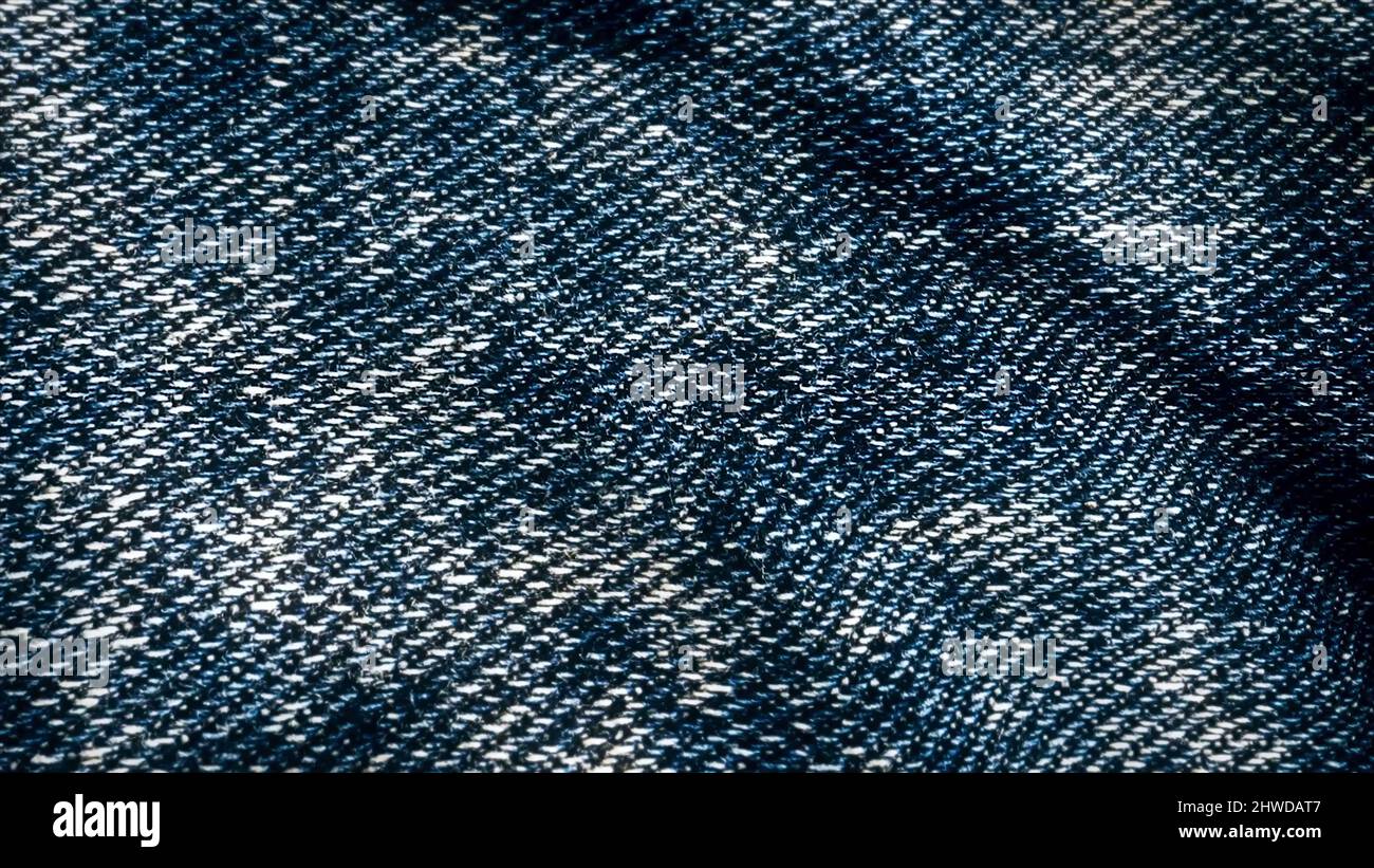 Denim fabric textured blue fluttering. Animated movement of the canvas ...