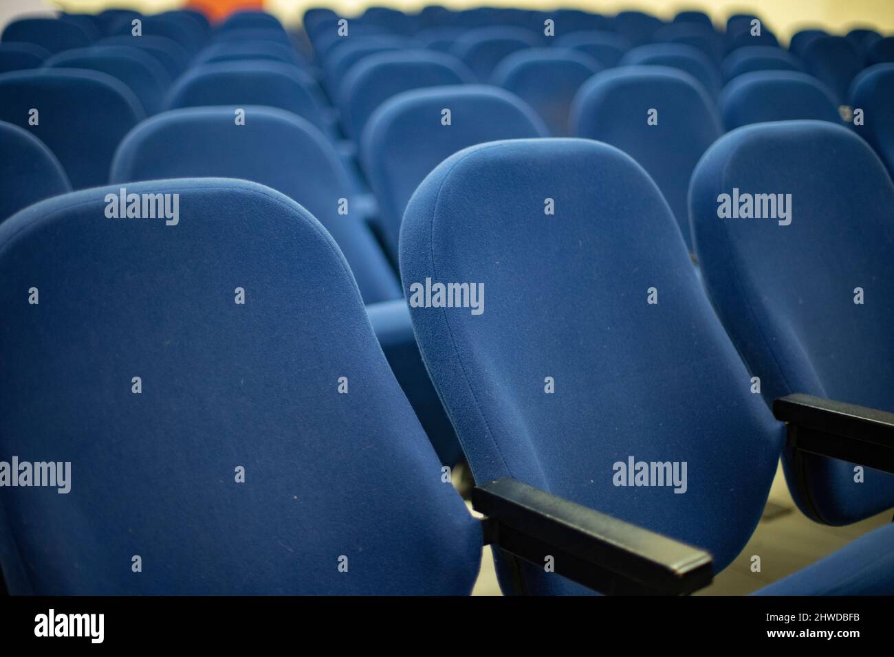 Seats are blue. Interior details. Chairs in cinema. Room for watching ...