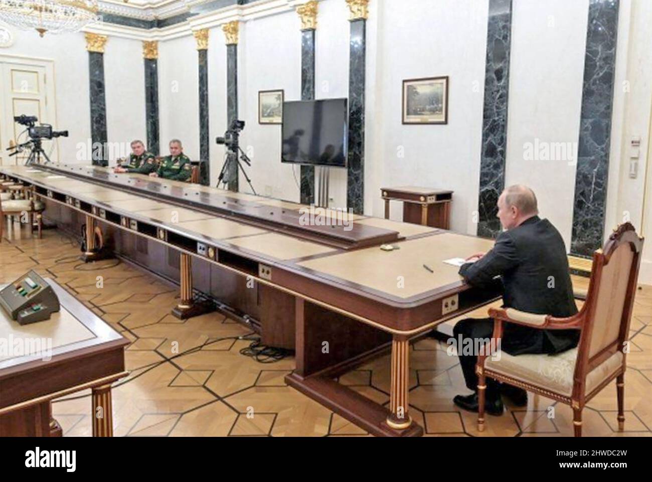 VLADIMIR PUTIN, President of Russia, seated right talks with Valery ...