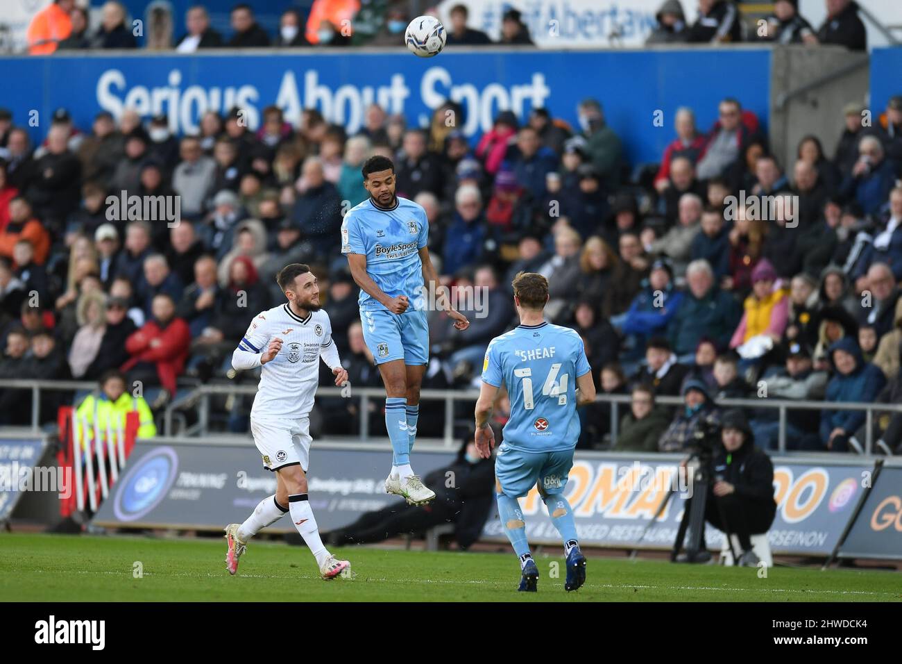 Jake Clarke-Salter #3 of Coventry City wins the header, Matt Grimes #8 ...