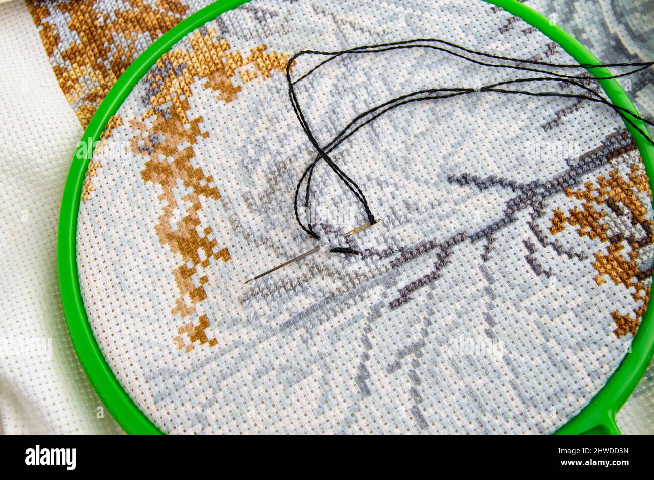 Flat lay embroidery Hoop with canvas and bright sewing thread and ...
