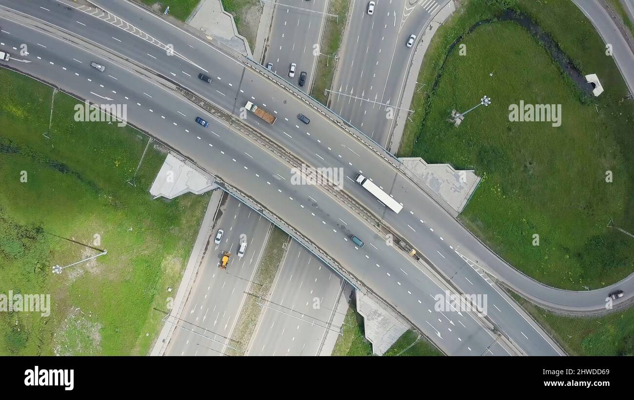 Elevated expressway. Clip. Top view at curves and lines of city highway ...
