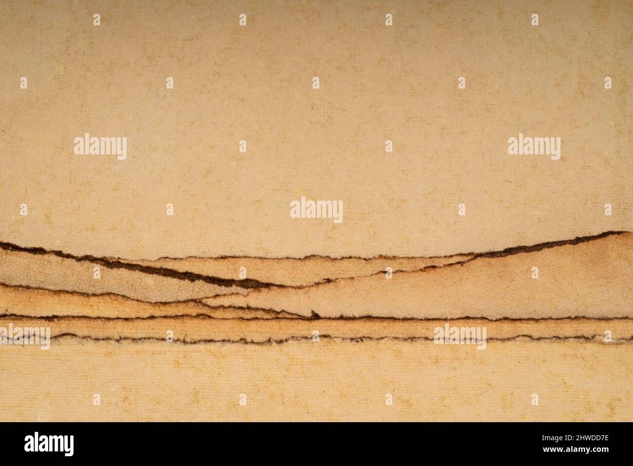 abstract desert landscape created with sheets of textured yellow ...