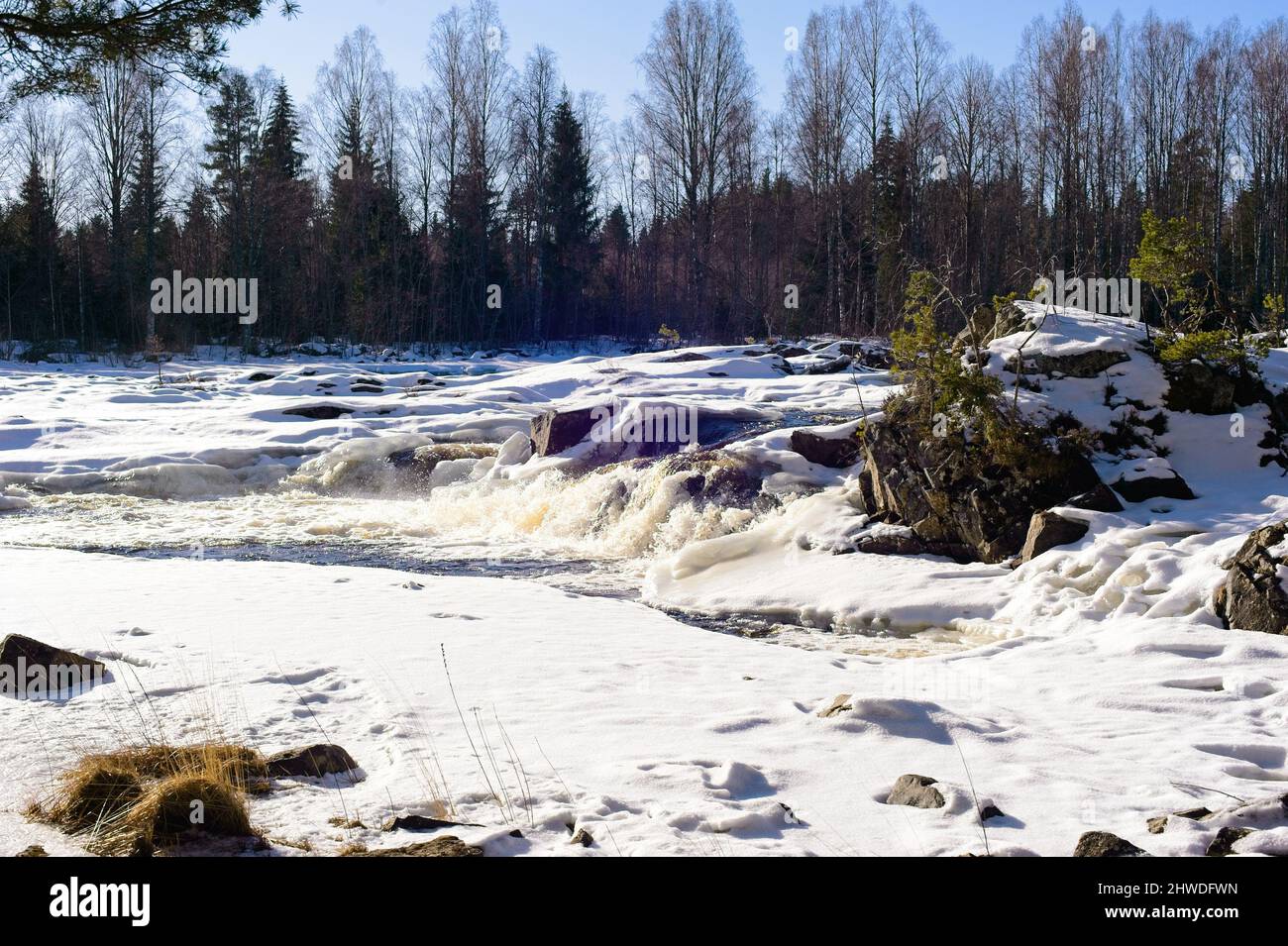 Scenes of a partly frozen river in Dalarna Stock Photo - Alamy