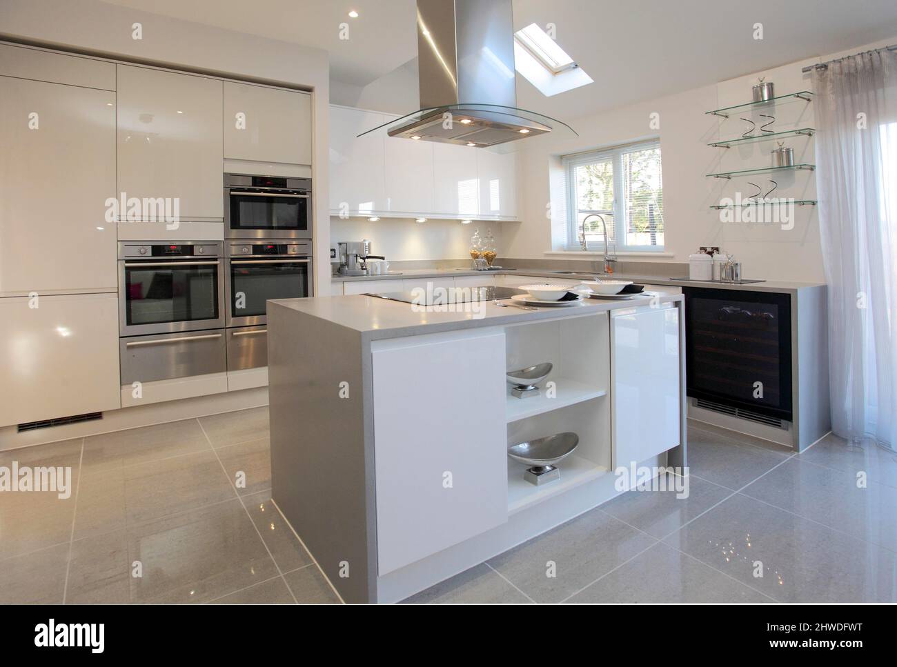 Kitchen with centre island cooking area in modern showhome Stock Photo ...