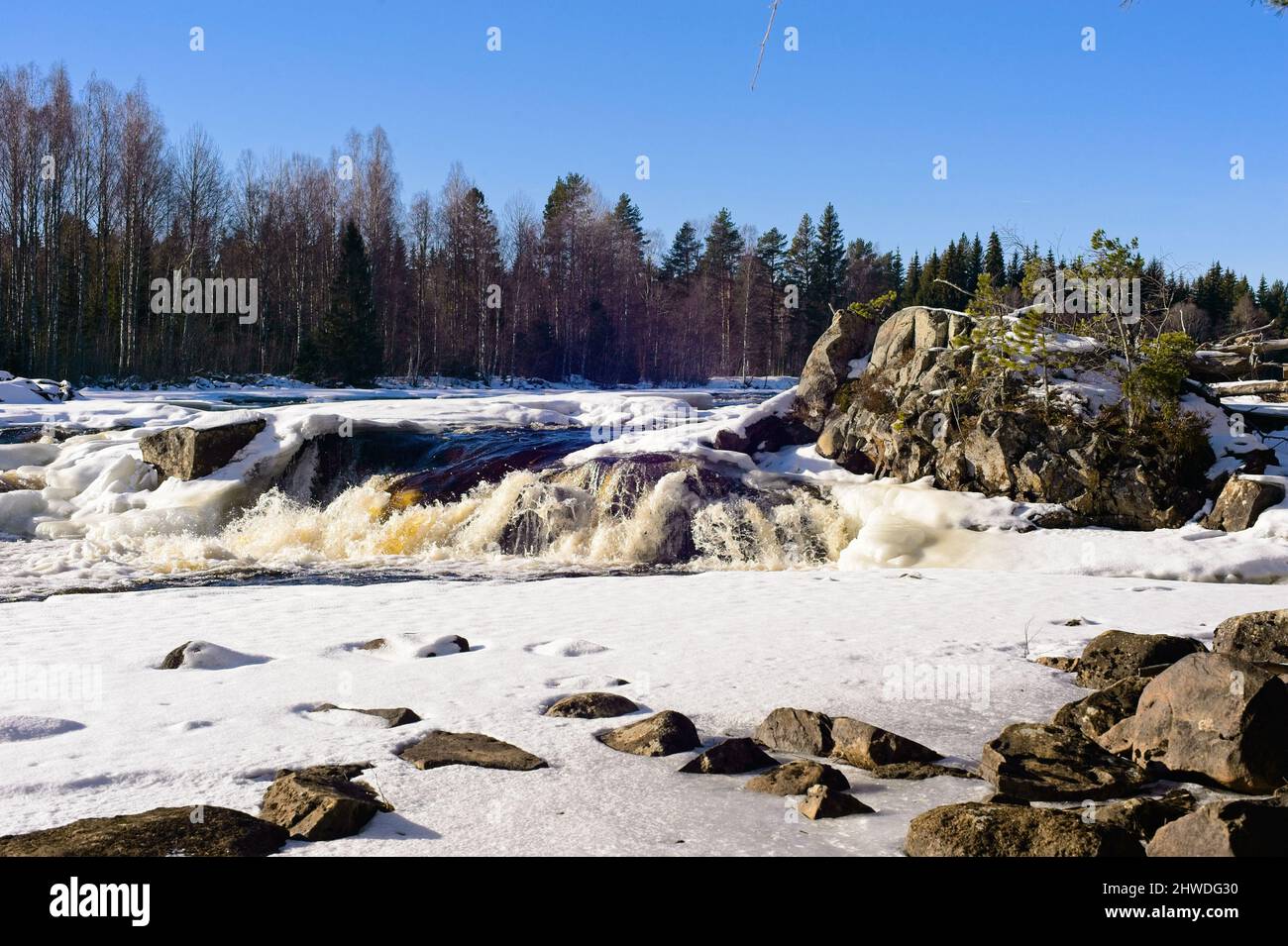 Scenes of a partly frozen river in Dalarna Stock Photo - Alamy