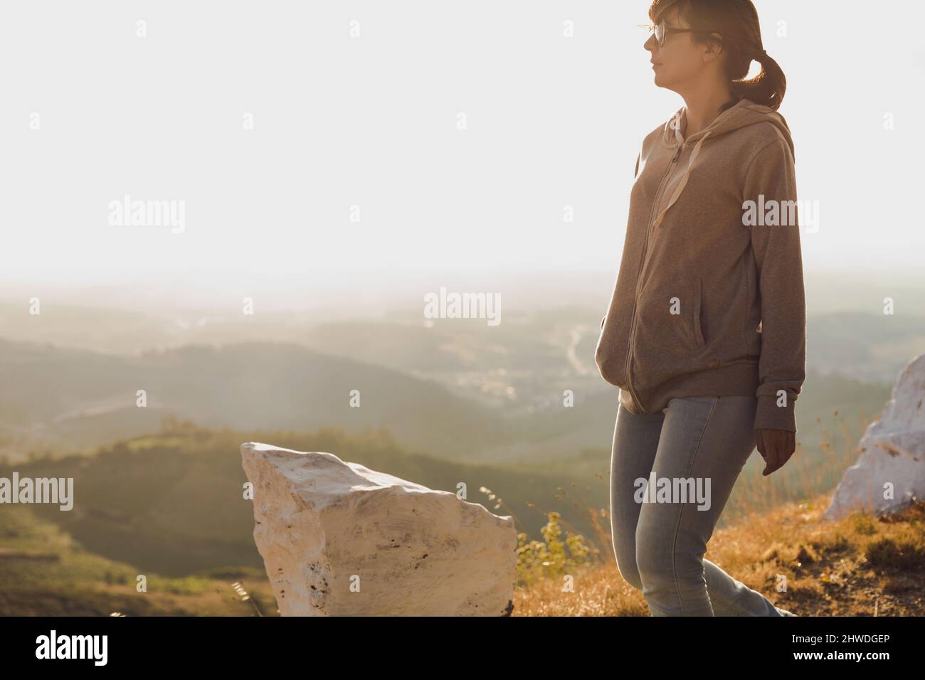 Woman walking alone mountains hi-res stock photography and images - Alamy