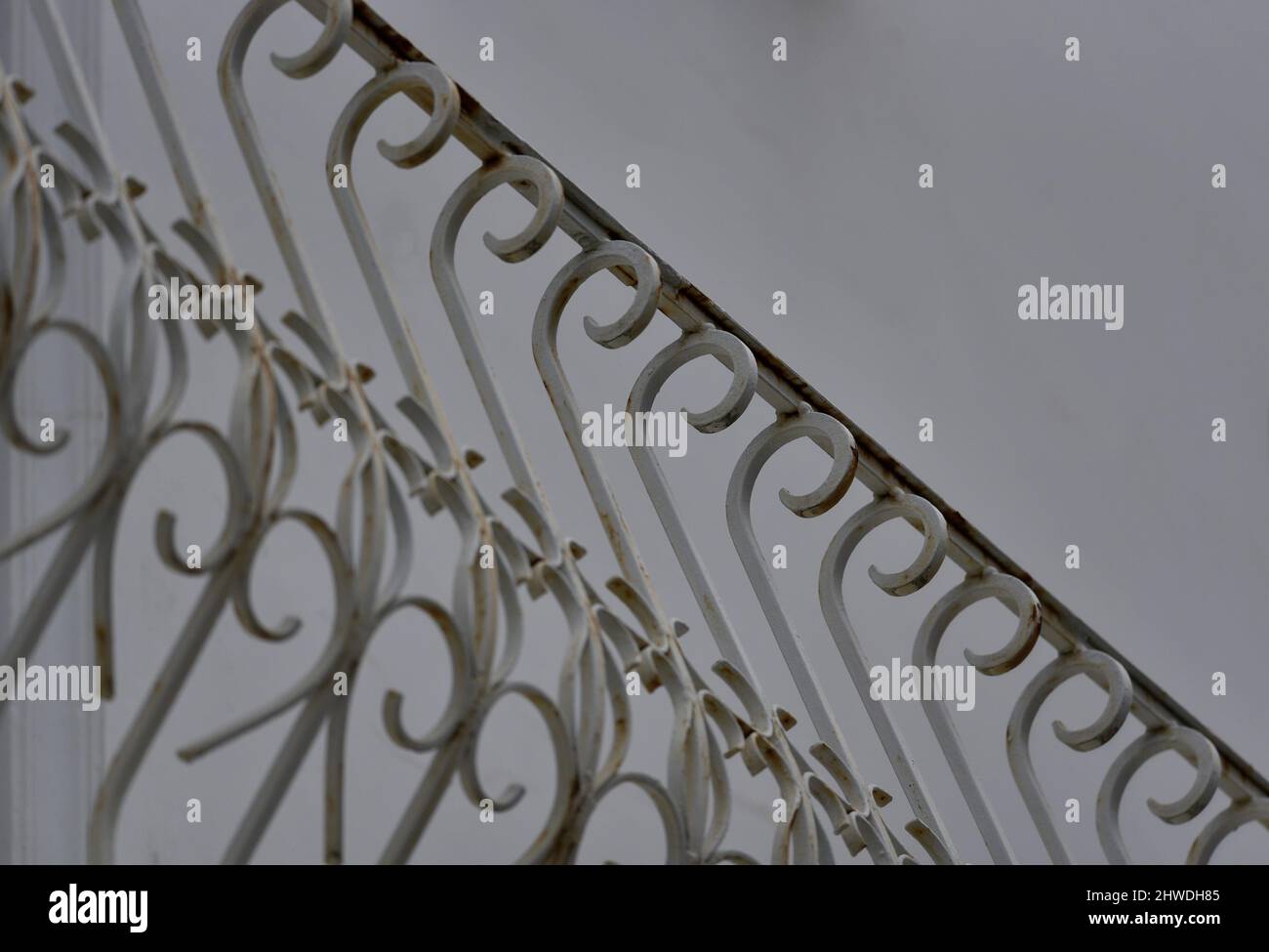 Traditional handcrafted forged iron stairway railing in Nafplio, Greece ...