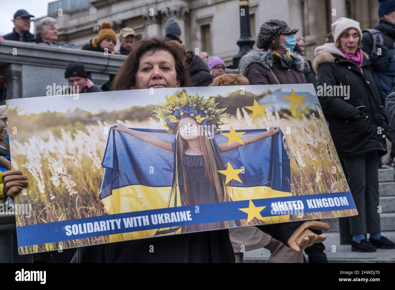 London, UK. 5th Mar 2022. Woman holds solidarity poster. Ukrainians and ...