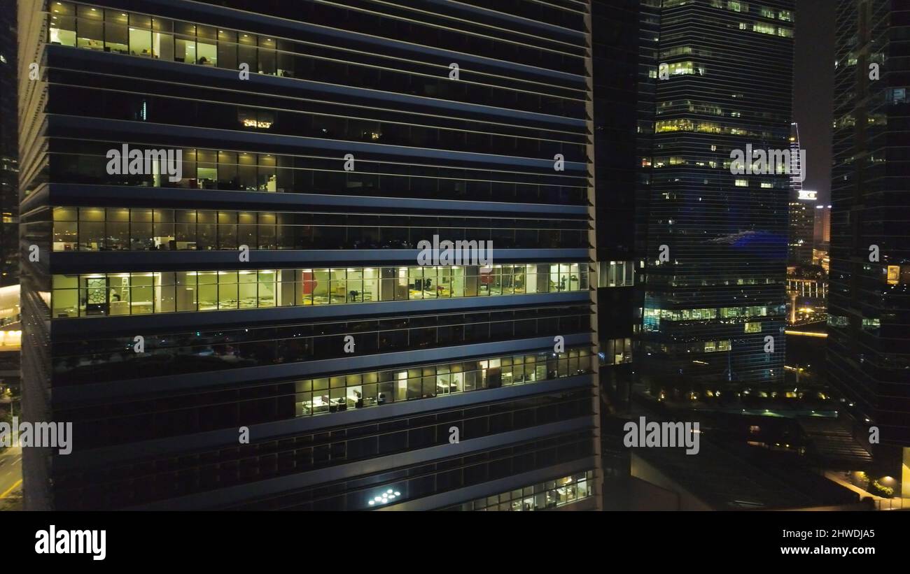 Commercial office buildings exterior. Shot. Night view at skyscrapers ...