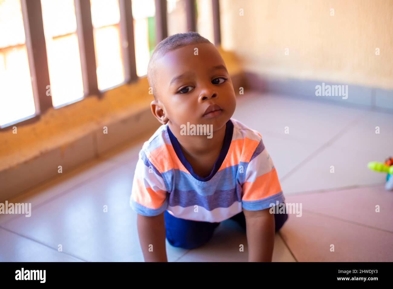 close up of a young african boy looking side ways Stock Photo - Alamy