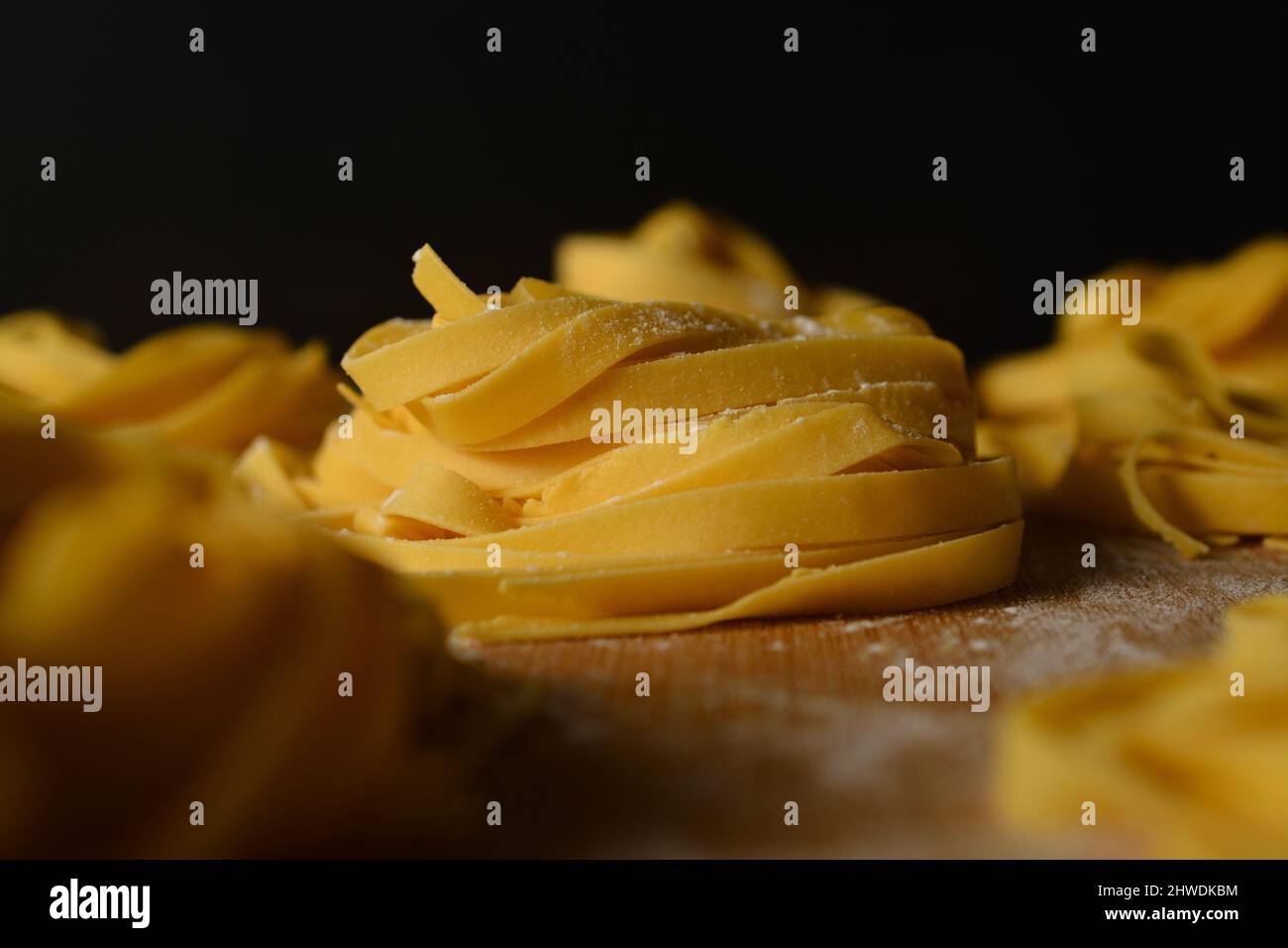 Tagliatelle. Freshly made pasta rolled into a nest Stock Photo - Alamy