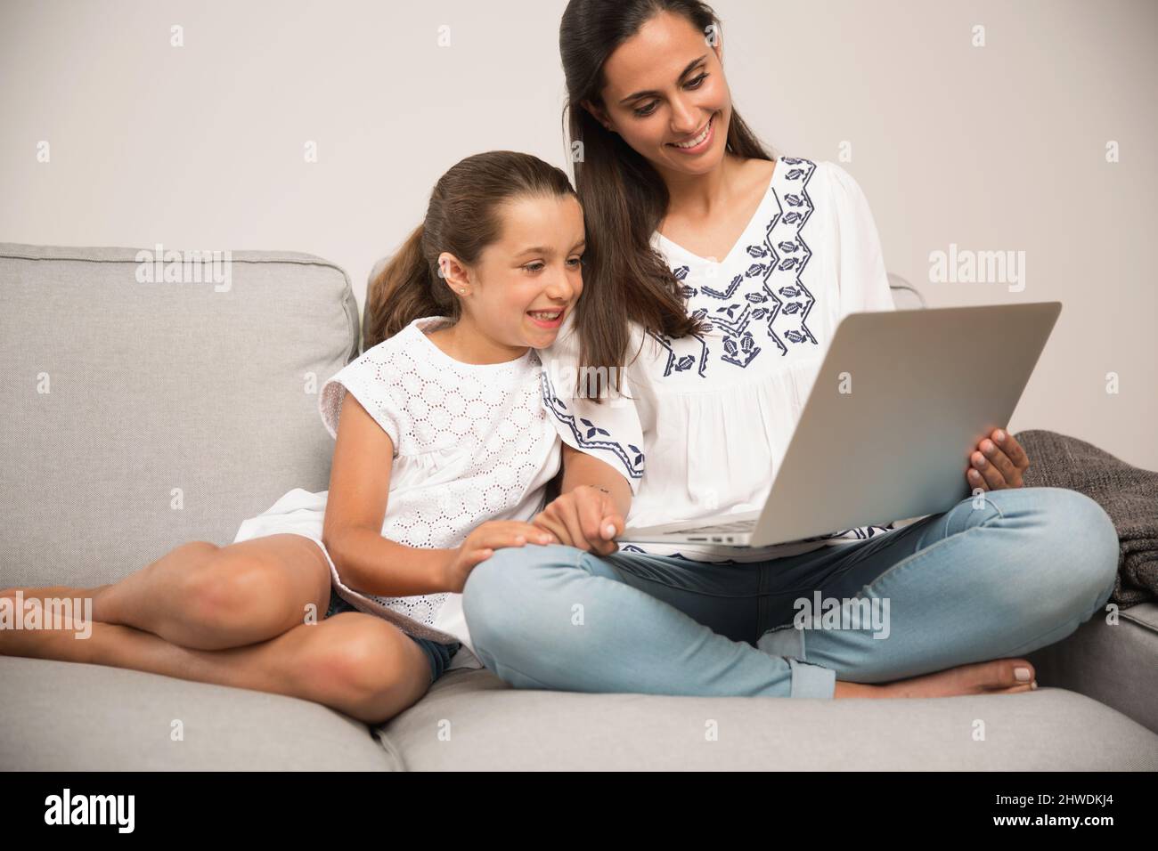 Mom and daughter laptop hi-res stock photography and images - Alamy