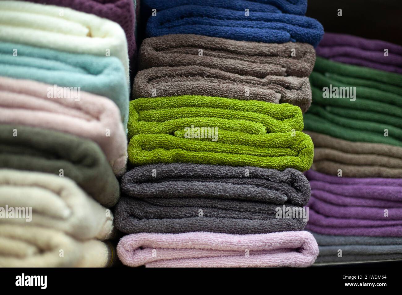 Towels stacked. Towel for bathroom. Things made of fabric lie flat on ...