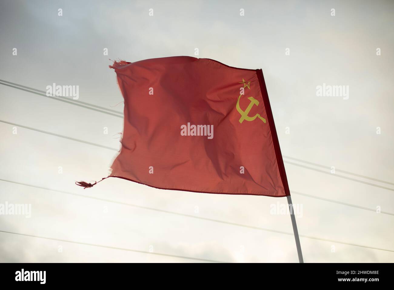 Red banner with hammer and sickle. Flag of Soviet Union. Old symbol of ...