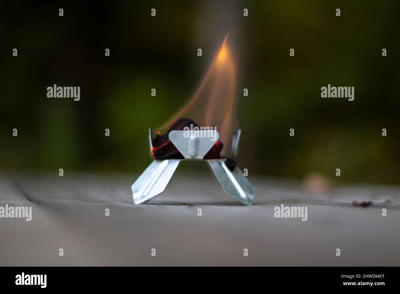 Flames from alcohol. Burning dry alcohol. Object for heating substances ...