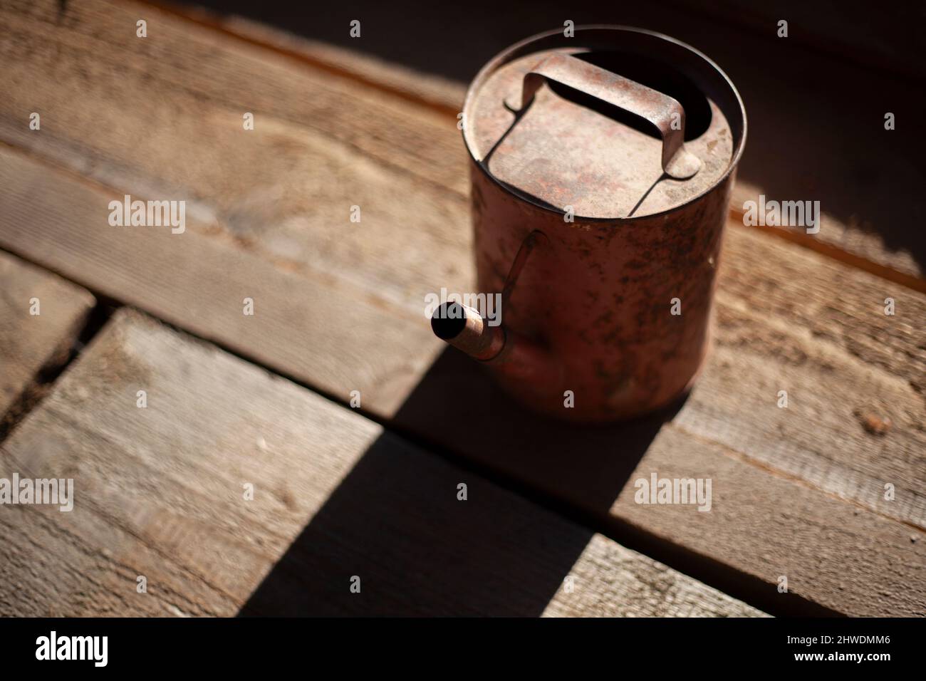 Watering can for garden. Gardener's tool. Steel water tank. Old thing ...