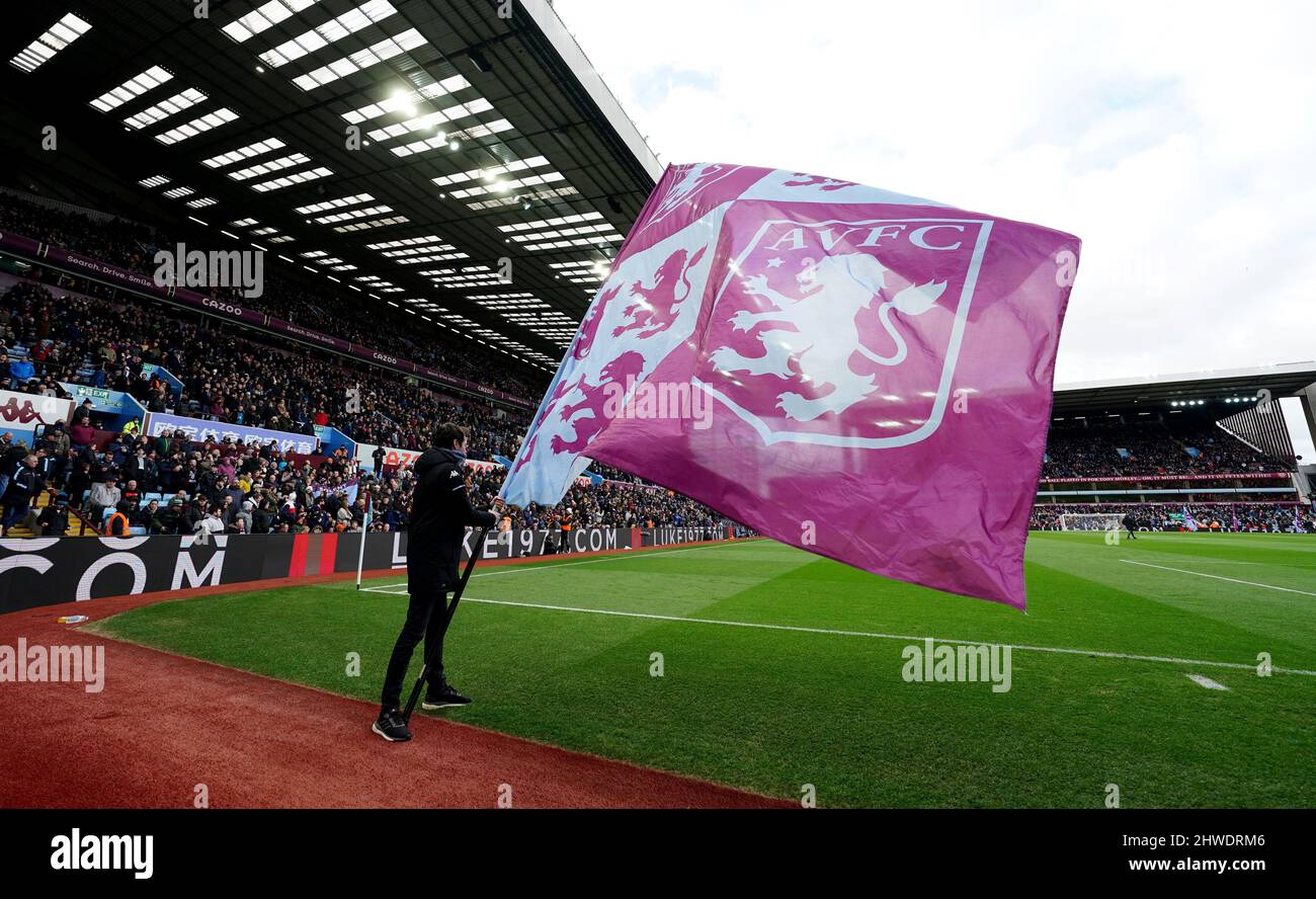 An Aston Villa flag is waved before the Premier League match at Villa ...